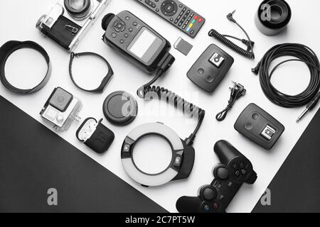 Different modern devices on black and white background Stock Photo - Alamy