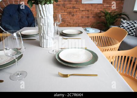 Table served in modern stylish dining room, top view Stock Photo - Alamy