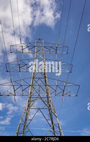 High voltage power lines supported by a steel stanchion Stock Photo - Alamy