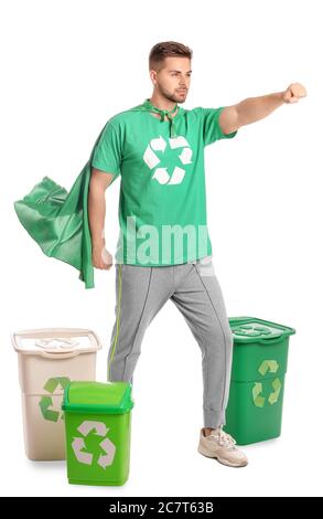 Man dressed as eco superhero with trash bin on color background Stock ...