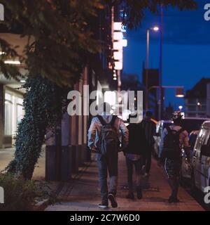 MUNICH, GERMANY - Jun 30, 2020: Illuminated ATM during the dark evening ...