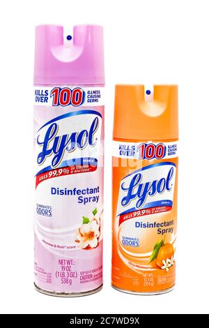 Two cans of Lysol disinfectant spray one pink, one orange Stock Photo ...