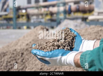 Person holding shredded paper used as an alternative fuel Stock Photo ...