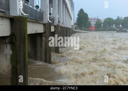 Funan, China's Anhui Province. 20th July, 2020. A villager works at ...