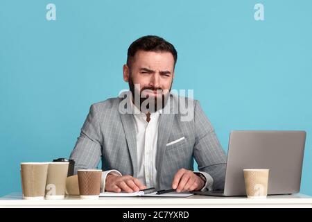 Millennial office employee whining or crying at desk because of too ...