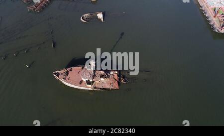 Ships decaying at the Arthur Kill Ship graveyard along the Arthur Kill ...