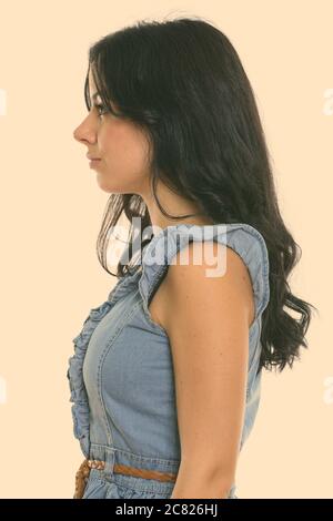Profile view of young beautiful Spanish woman Stock Photo - Alamy