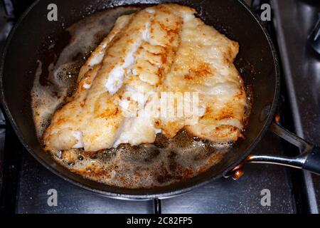Lightly fried cod Stock Photo - Alamy