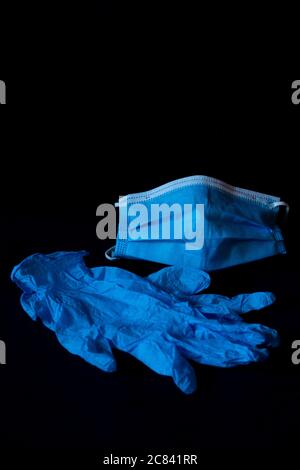 blue protective gloves, with black rubber Stock Photo - Alamy