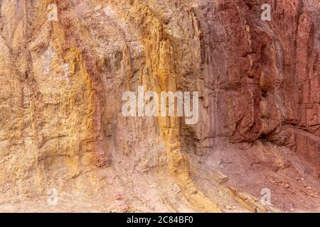 Yellow-red shaded rock layer surface Stock Photo - Alamy
