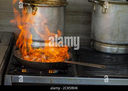 Process of frying and flaming shrimp in a pan Stock Photo - Alamy