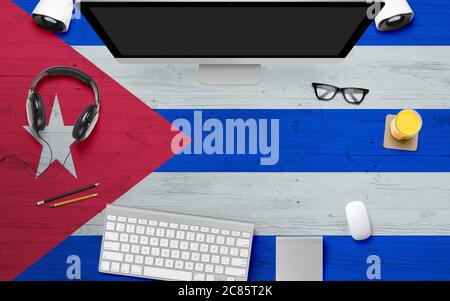 Cuba national flag background with workspace, desktop computer and ...