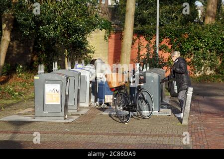 Waste separation with separate underground containers for plastics and ...