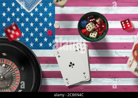poker chips, usa flag on blackjack table Stock Photo - Alamy