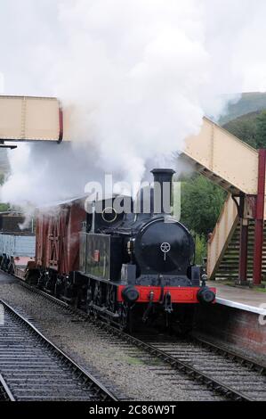 LNWR 'Coal Tank' 0-6-2T No. 1054 approcches Williton station on the ...