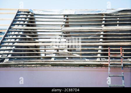 Removal of old roof replacement with new shingles of an apartment ...