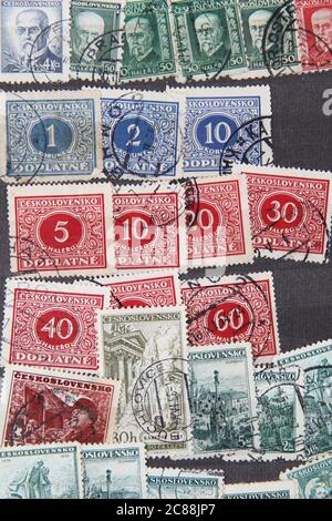 used postage stamps collection as nice background Stock Photo - Alamy