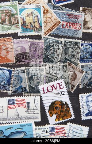 used postage stamps collection as nice background Stock Photo - Alamy