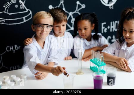 biology science. Little boy is making science experiments. little boy ...