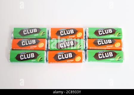 A mix of McVities Club chocolate biscuit bars Mint and Orange flavour ...
