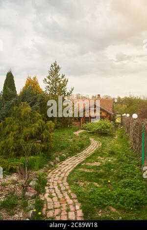 wooden house and stone path Stock Photo - Alamy