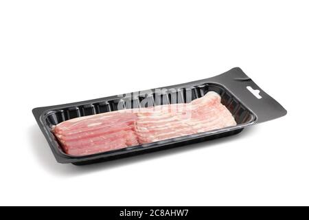 Bacon in plastic tray, close up Stock Photo - Alamy
