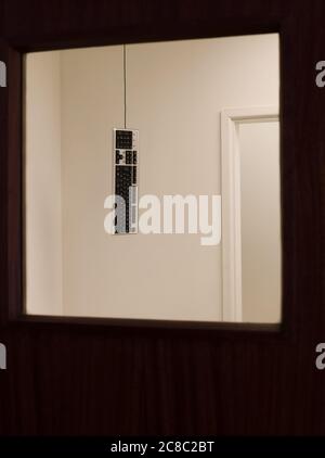 Keyboard hanging from ceiling Stock Photo - Alamy