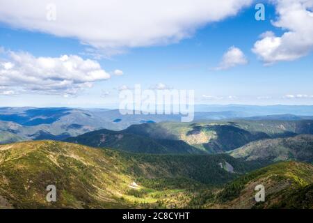 Magnificent view of the mountains from Chersky Peak. Mountain peaks of ...