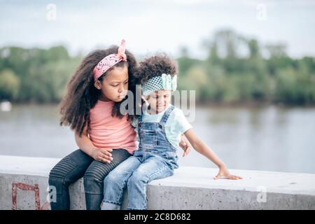 African sfriend children on background of natural. looking in side. The ...