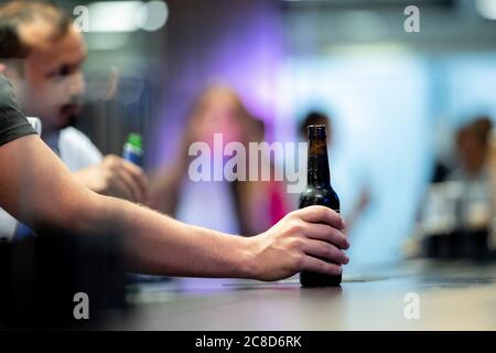 People drinking beer at events receptions and bars Stock Photo - Alamy