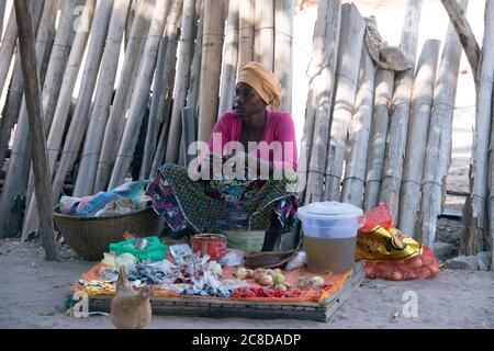 An ethnic Jola tribe woman in colourful traditional clothing at a ...