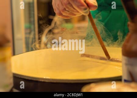 French pancake cooking process. Street food in Paris Stock Photo - Alamy