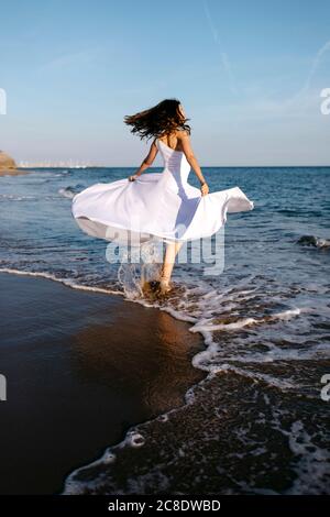 Ballerina dancing by the sea Stock Photo - Alamy
