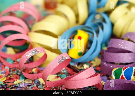 closeup of colorful party streamers on confetti Stock Photo - Alamy