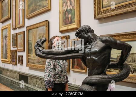 An athlete wrestling a python Stock Photo - Alamy