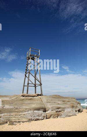 Shark Tower at Redhead Beach Stock Photo - Alamy