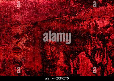 Crimson colored abstract wall background with textures of different ...