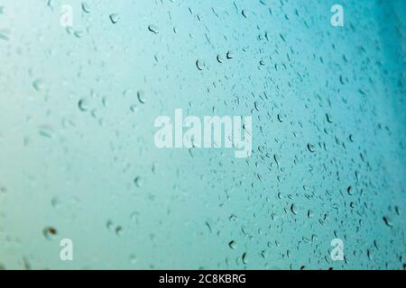 Rain droplets on blue glass background, Water drops on blue glass Stock ...