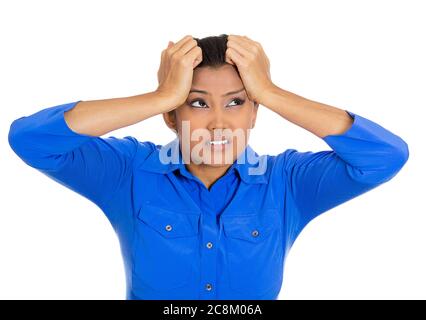 Woman feeling overwhelmed and having a headache while sitting at a park ...