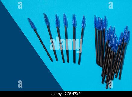 Blue brushes for eyelashes and eyebrows on a white background Stock ...