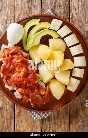 Bermuda codfish breakfast with onion tomato sauce, boiled potatoes ...