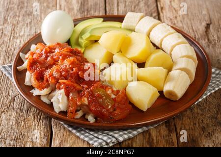 Bermuda codfish breakfast with onion tomato sauce, boiled potatoes ...