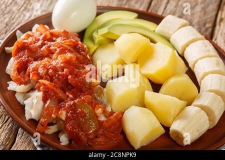 Bermuda codfish breakfast with onion tomato sauce, boiled potatoes ...