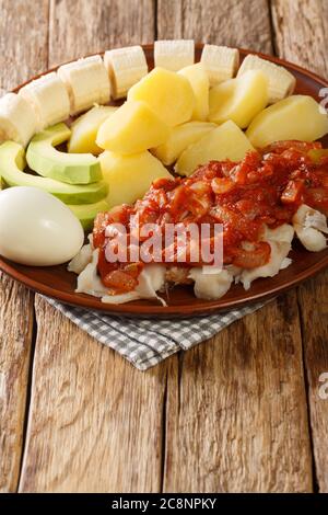 Bermuda codfish breakfast with onion tomato sauce, boiled potatoes ...