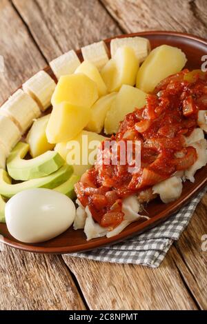 Bermuda codfish breakfast with onion tomato sauce, boiled potatoes ...