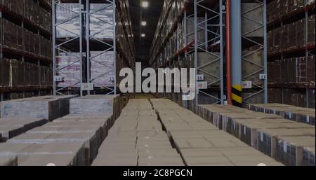 Mobile aisle racking system in distribution warehouse Stock Photo - Alamy