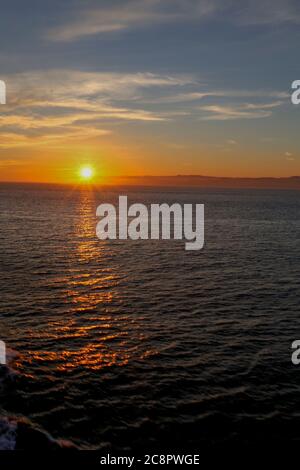 sunset over Alaska fjords on a cruise trip near Ketchikan, Alaska, USA ...