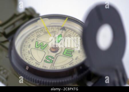 Closeup green color military compass on isolated white background Stock ...