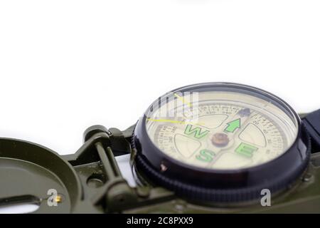 Closeup green color military compass on isolated white background Stock ...