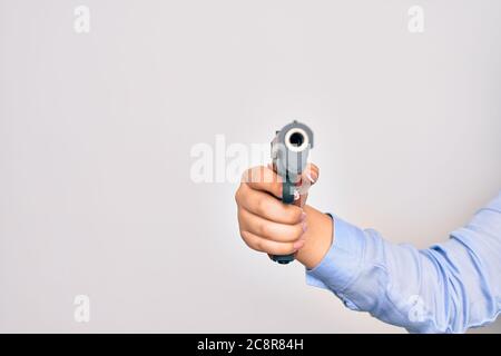 Photo of woman hand holding revolver handgun isolated on white ...
